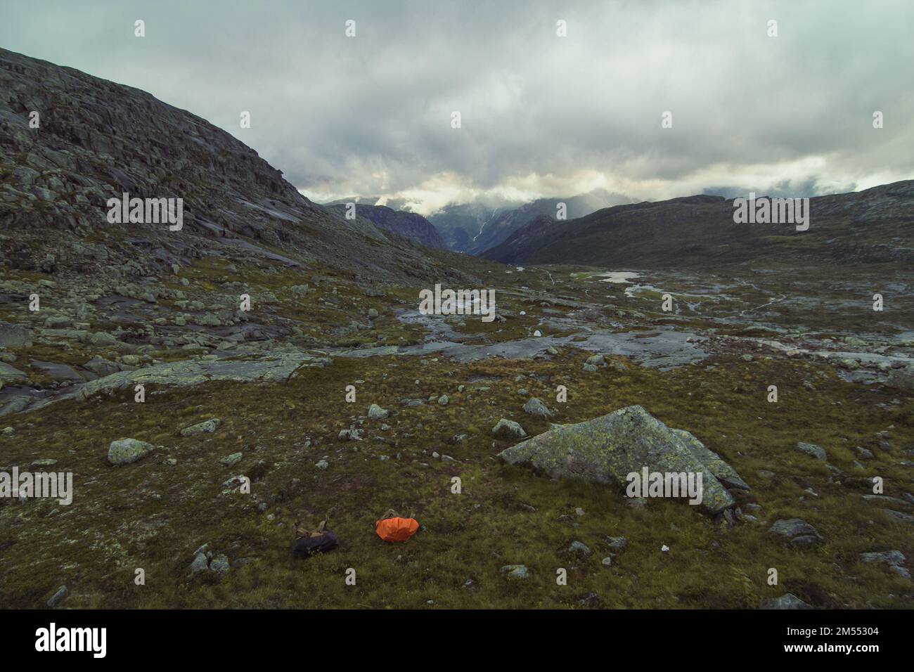 Barren rock valley in mountain bottom landscape photo Stock Photo - Alamy