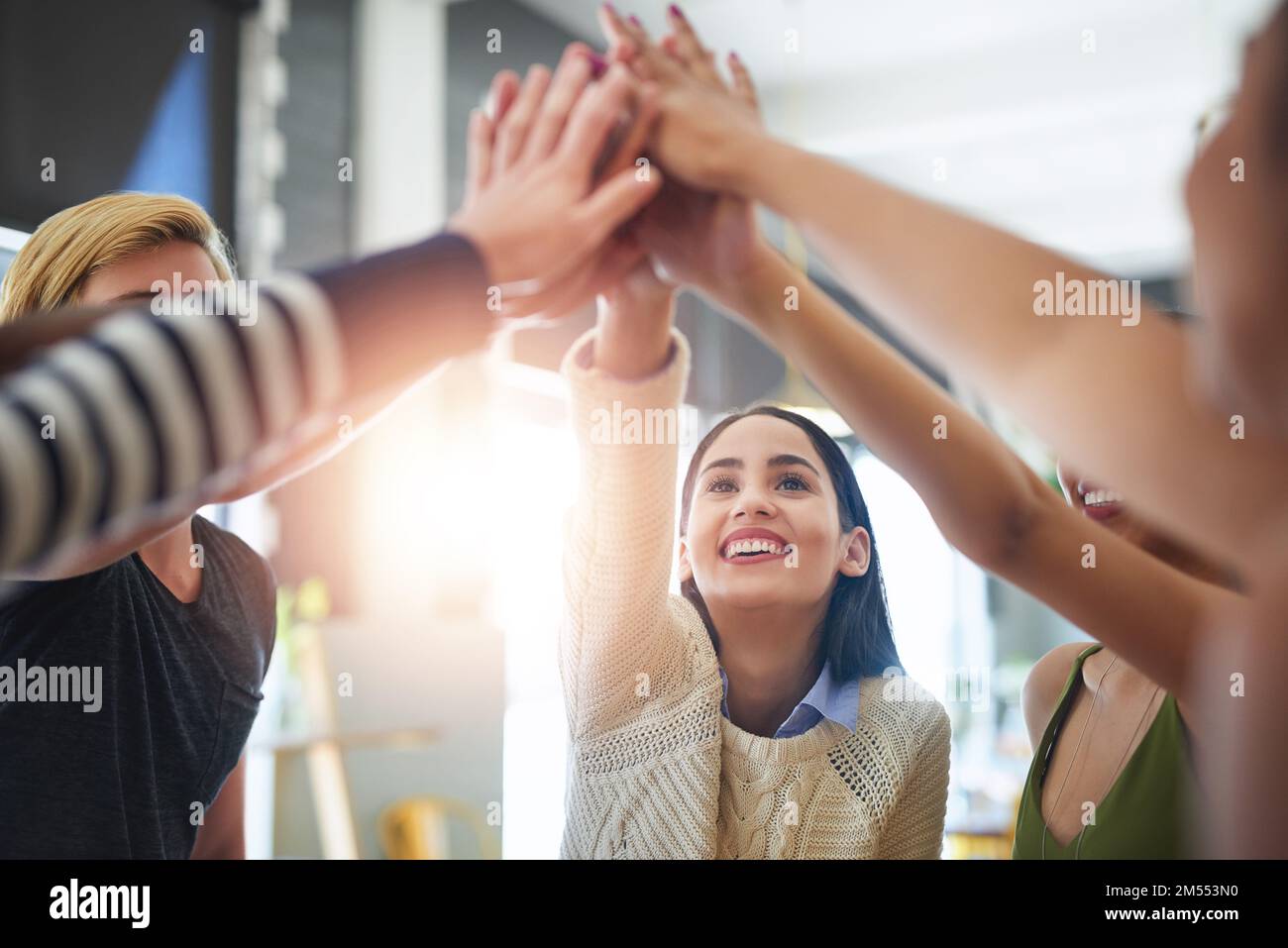 Taking their grades to new heights. a group of happy friends high ...