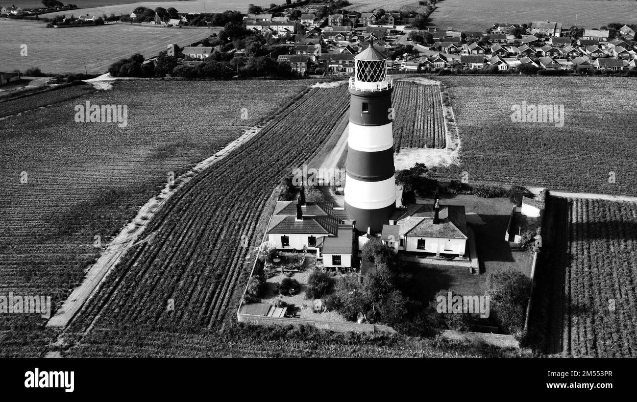An aerial grayscale of the Happisburgh Lighthouse in Hapiesburg ...