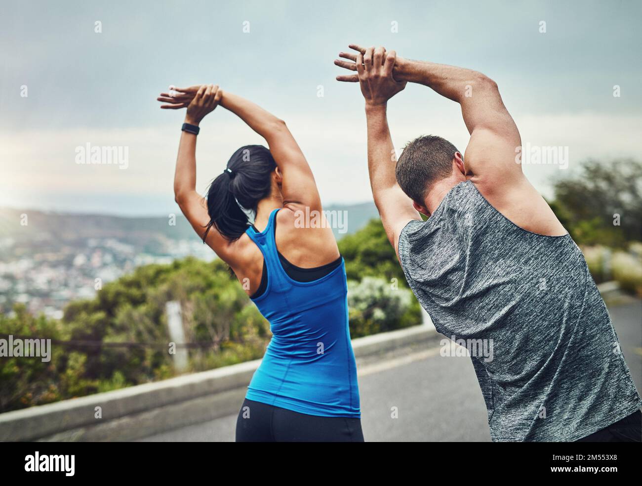 Dont let your partner exercise before stretching. an unrecognizable ...
