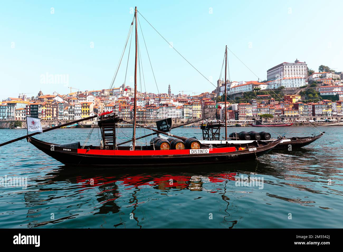 Traditional boats on Rio Douro. Portugal old town cityscape and Dom ...