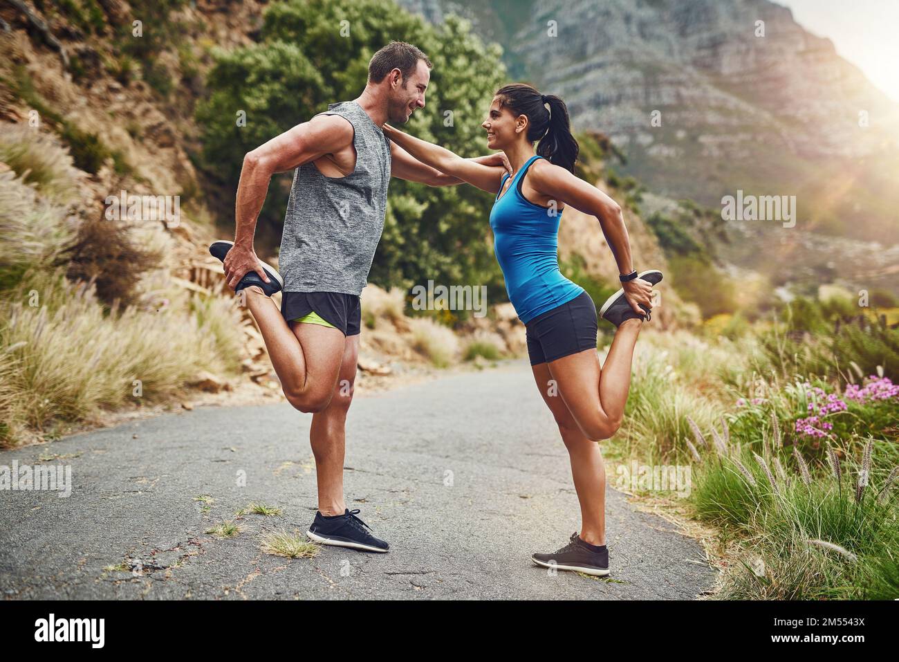 We help each other through it all. a young attractive couple training ...