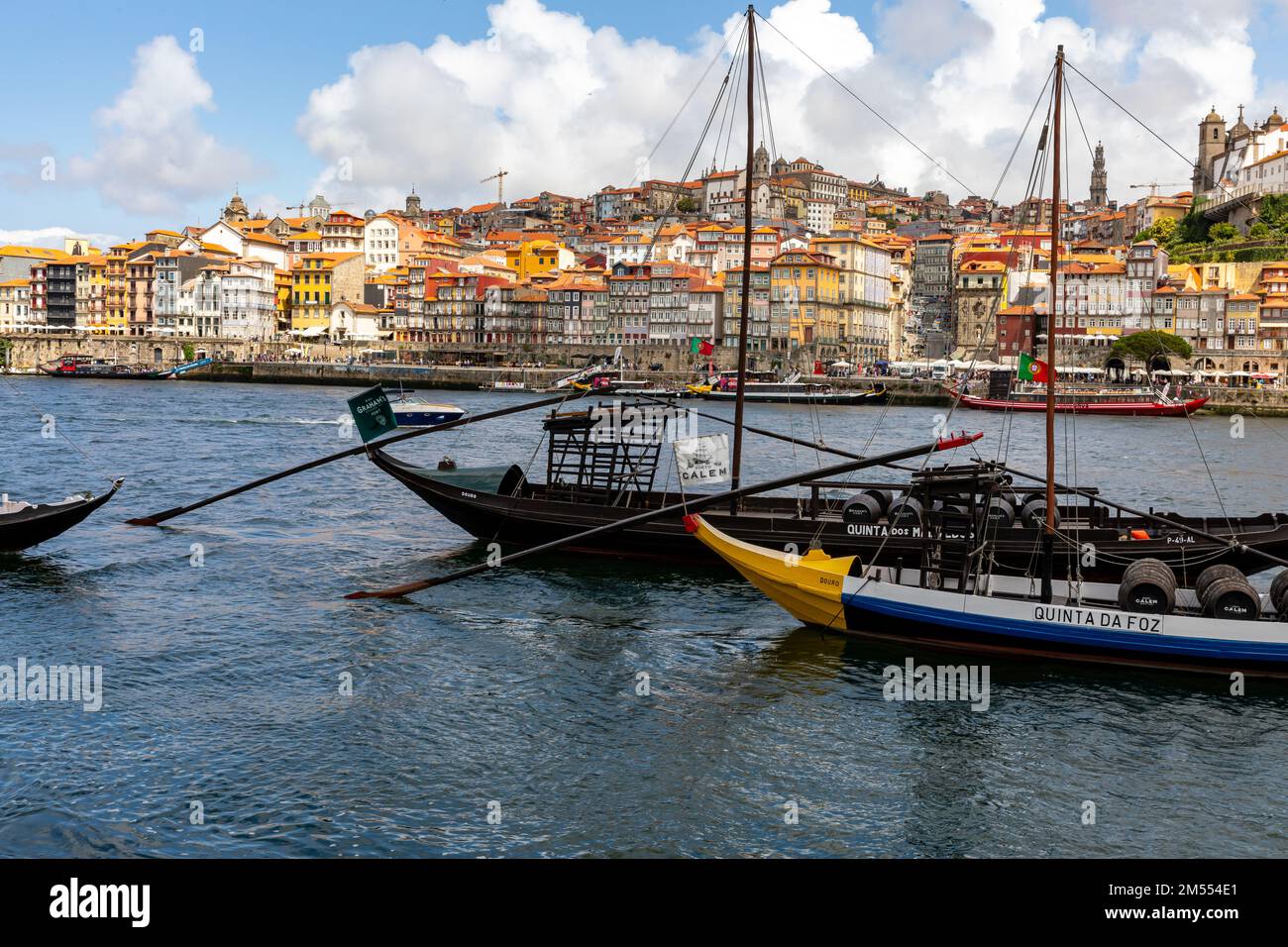 Traditional boats on Rio Douro. Portugal old town cityscape and Dom ...