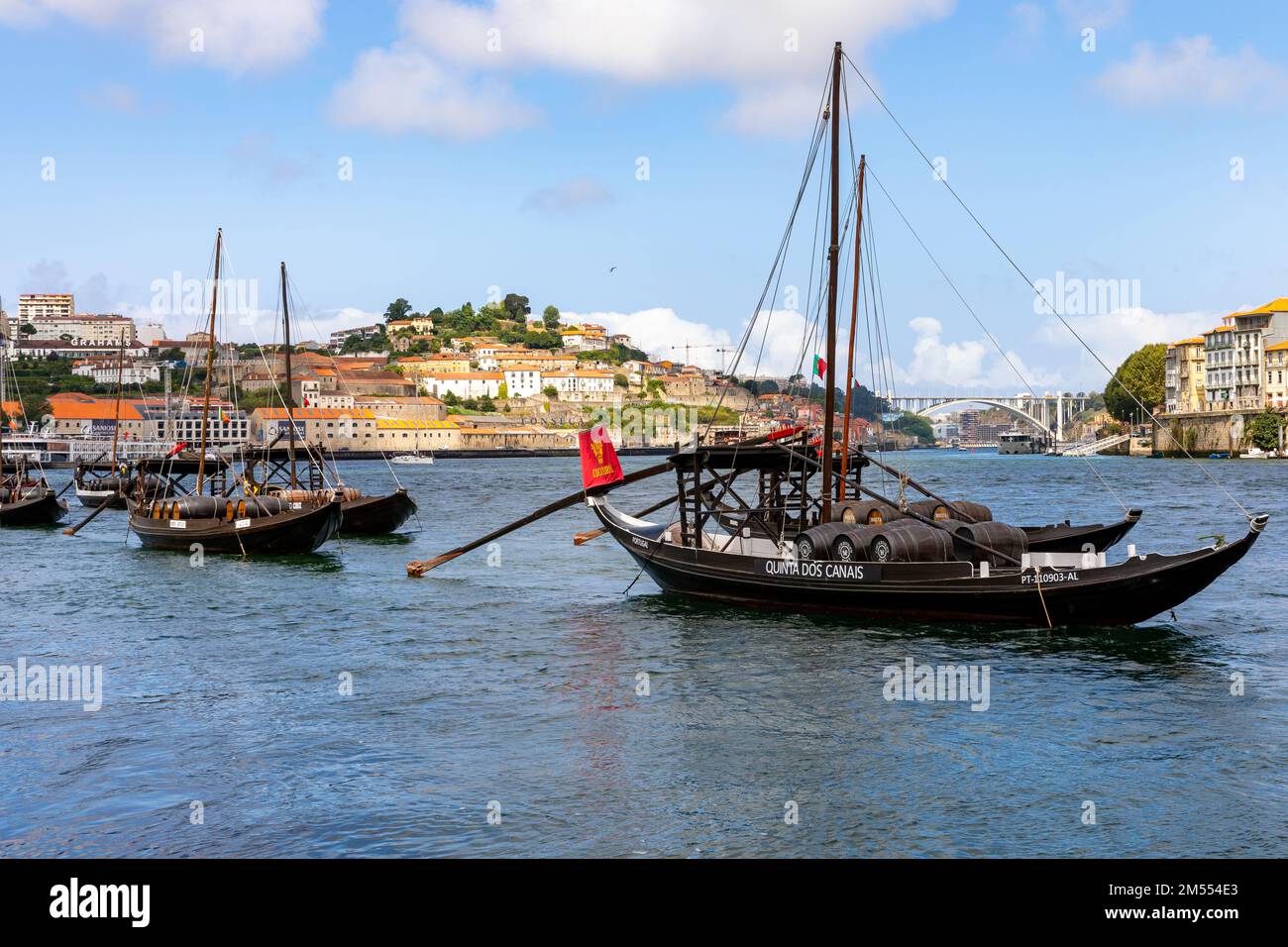 Traditional boats on Rio Douro. Portugal old town cityscape and Dom ...