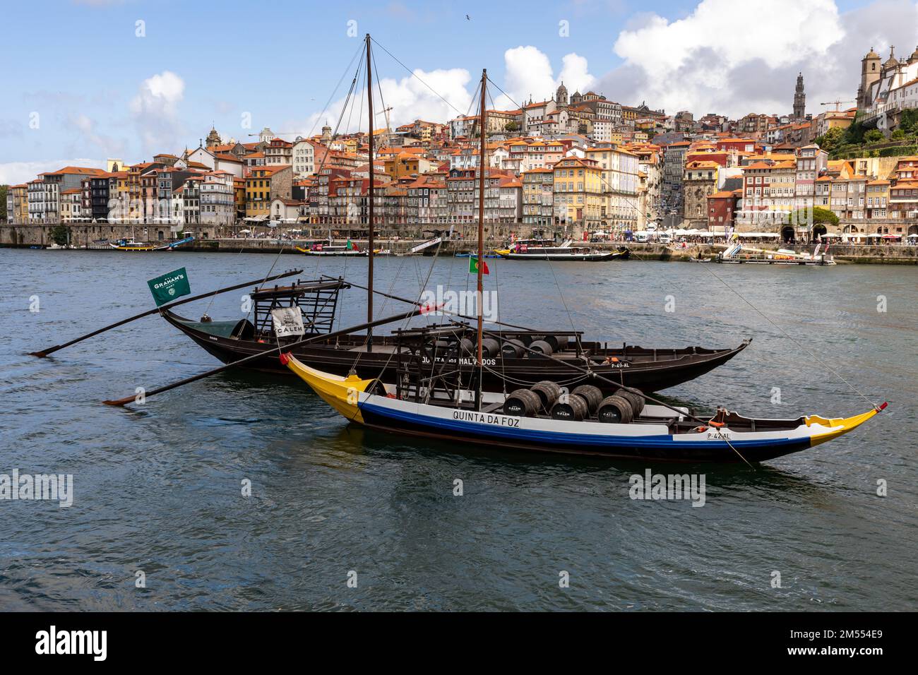 Traditional boats on Rio Douro. Portugal old town cityscape and Dom ...