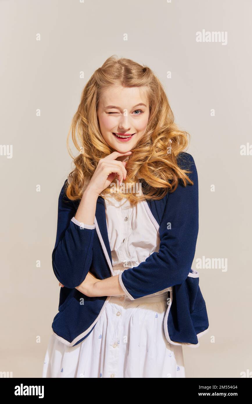 Woman wink 1960s hi-res stock photography and images - Alamy