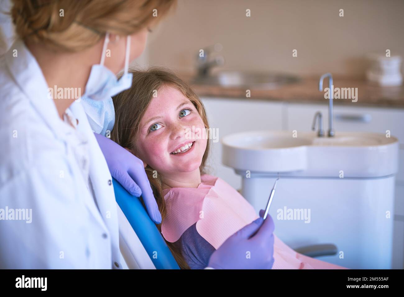 Eat less sugar, youre sweet enough. a dentist examining a little girls ...