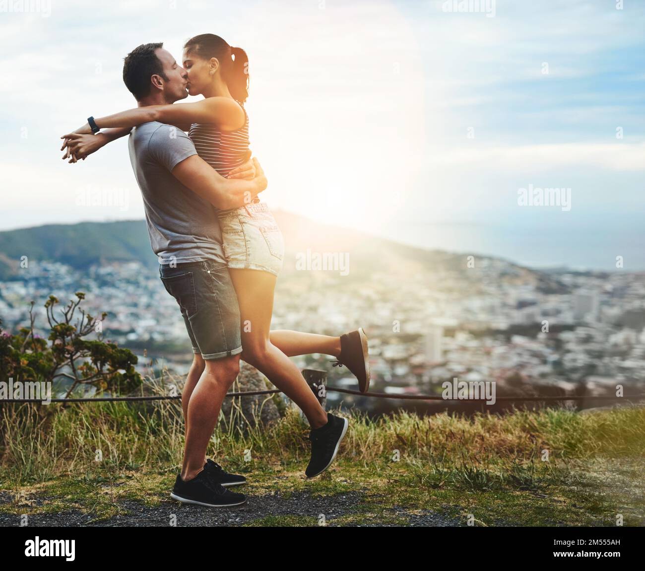 Falling head over hills in love. a young couple enjoying a romantic day ...