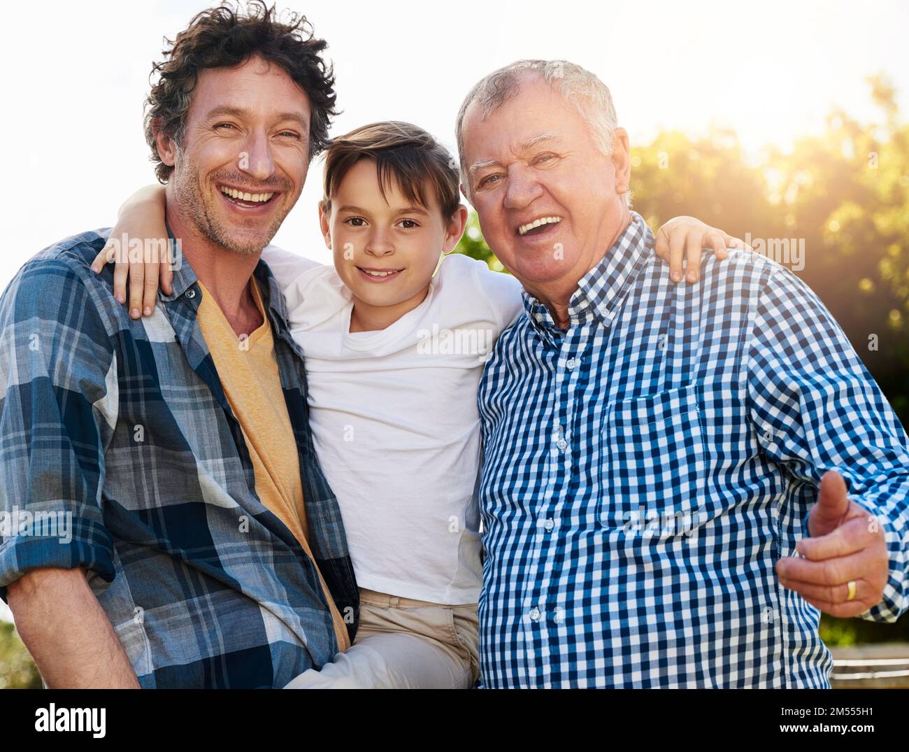 Growing up in a family of good men. Portrait of a young boy spending ...