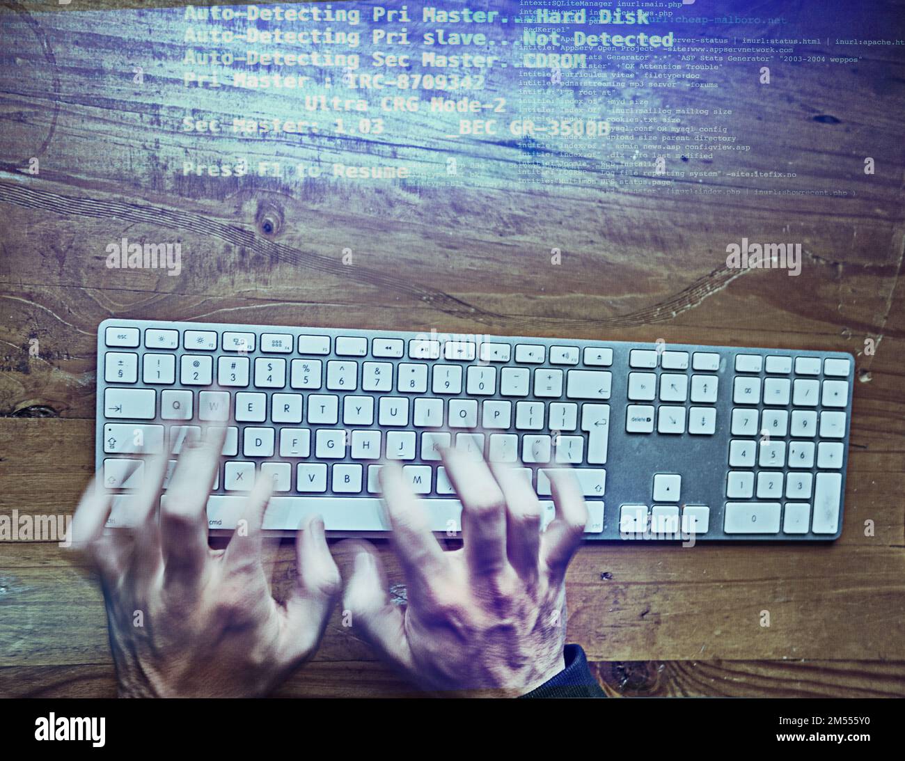 His fingers are flying across the keys. an unidentifiable hacker using ...