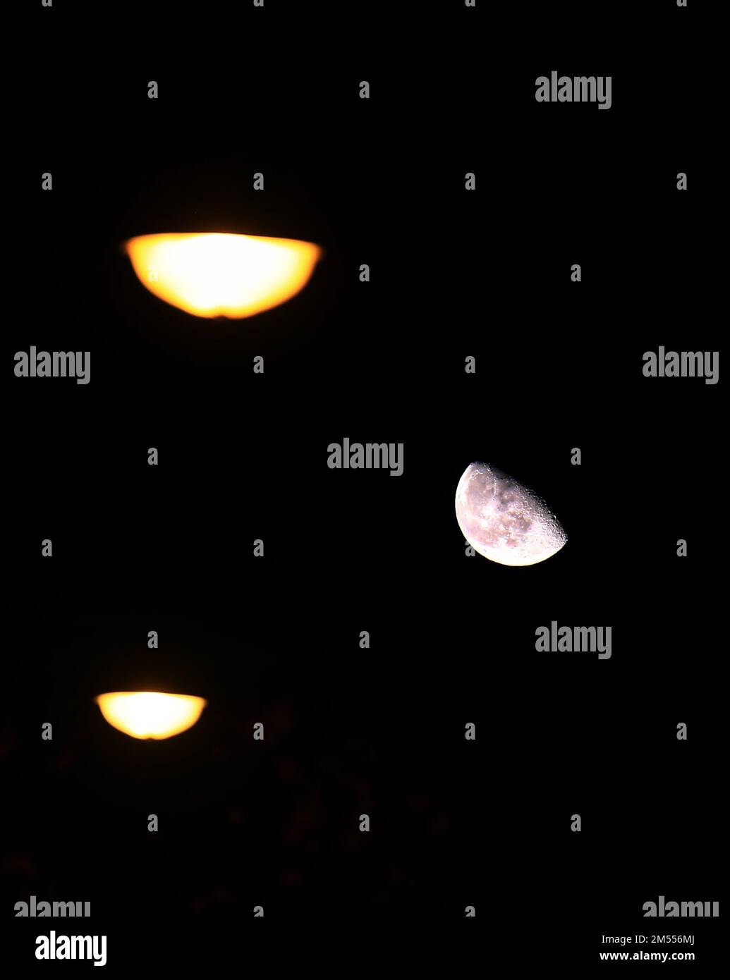 Abstract shot of defocused street lights and waning gibbous moon Stock ...