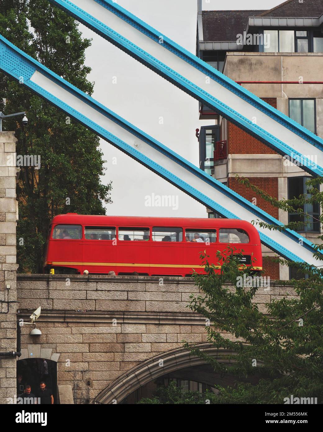A classic red bus on a bridge in London, UK Stock Photo - Alamy