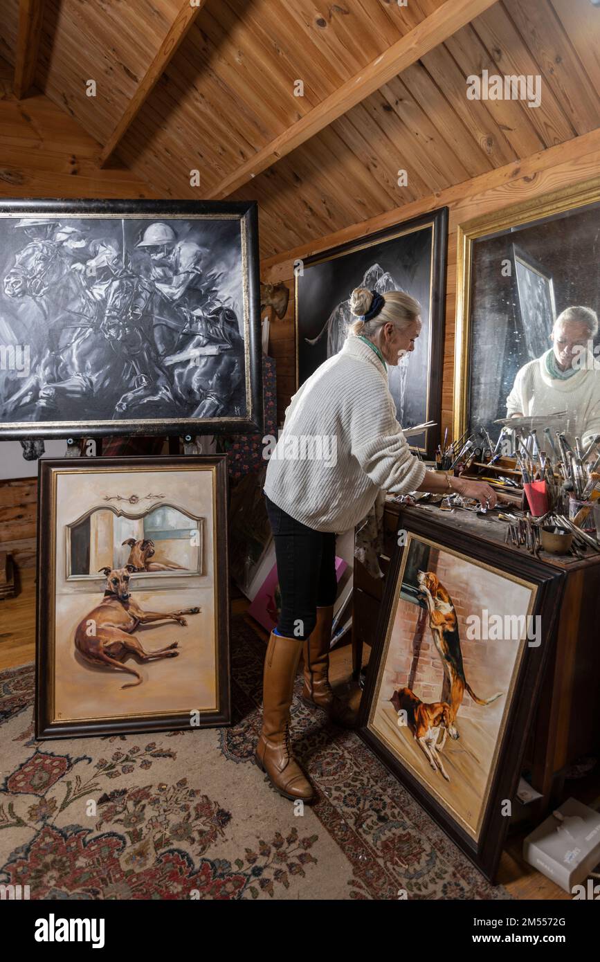 Picture shows artist Debbie Harris working in her garden studio based ...