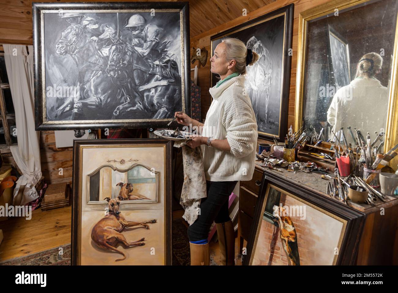 Picture shows artist Debbie Harris working in her garden studio based ...