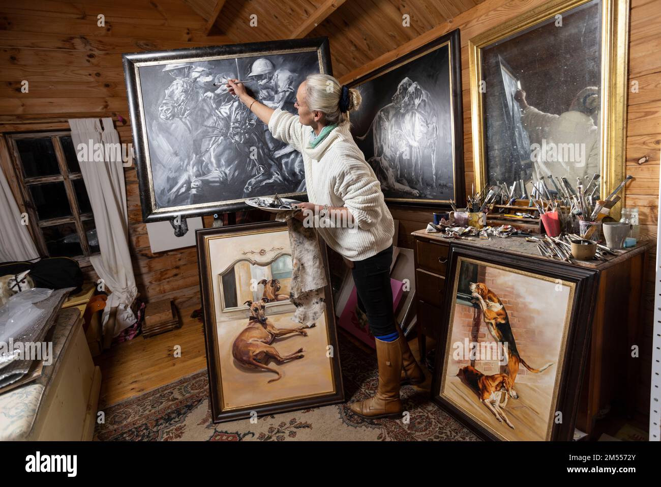 Picture shows artist Debbie Harris working in her garden studio based ...