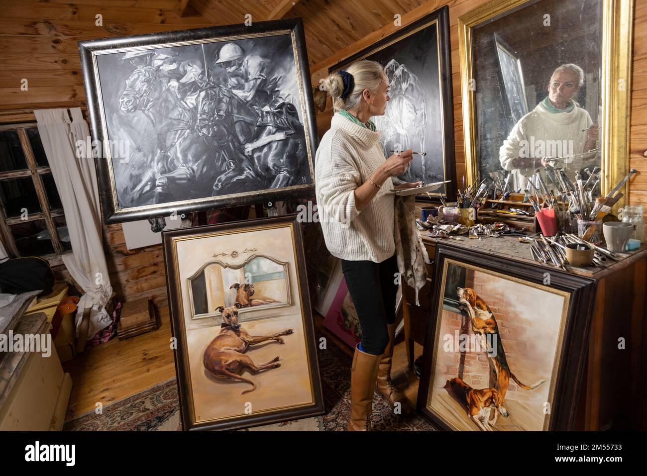 Picture shows artist Debbie Harris working in her garden studio based ...