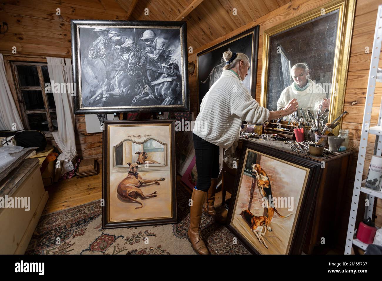 Picture shows artist Debbie Harris working in her garden studio based ...