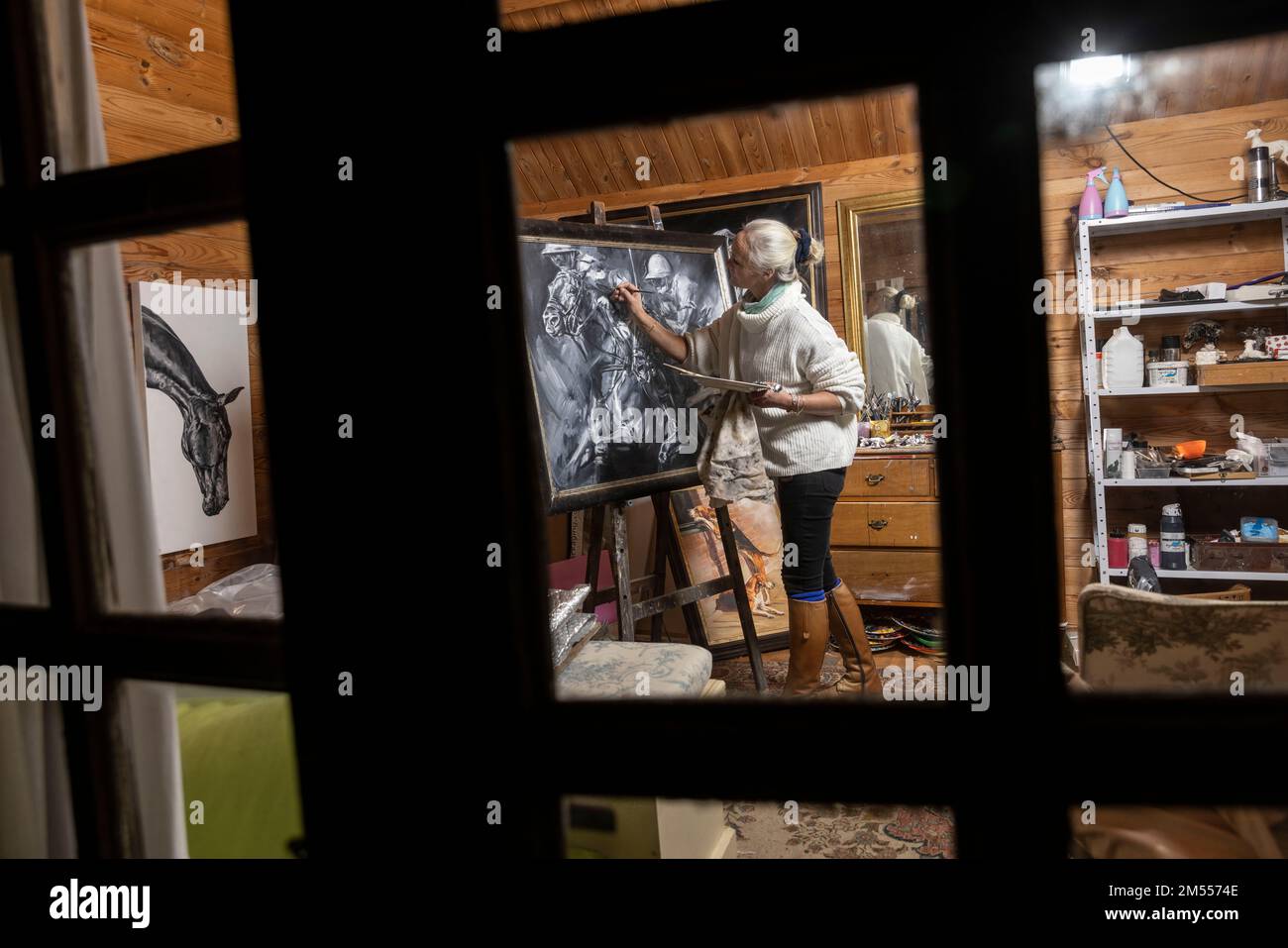 Picture shows artist Debbie Harris working in her garden studio based ...