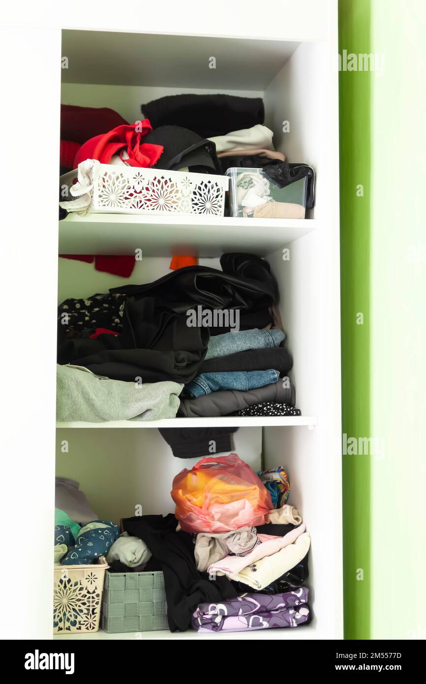 Messy wardrobe woman hi-res stock photography and images - Alamy