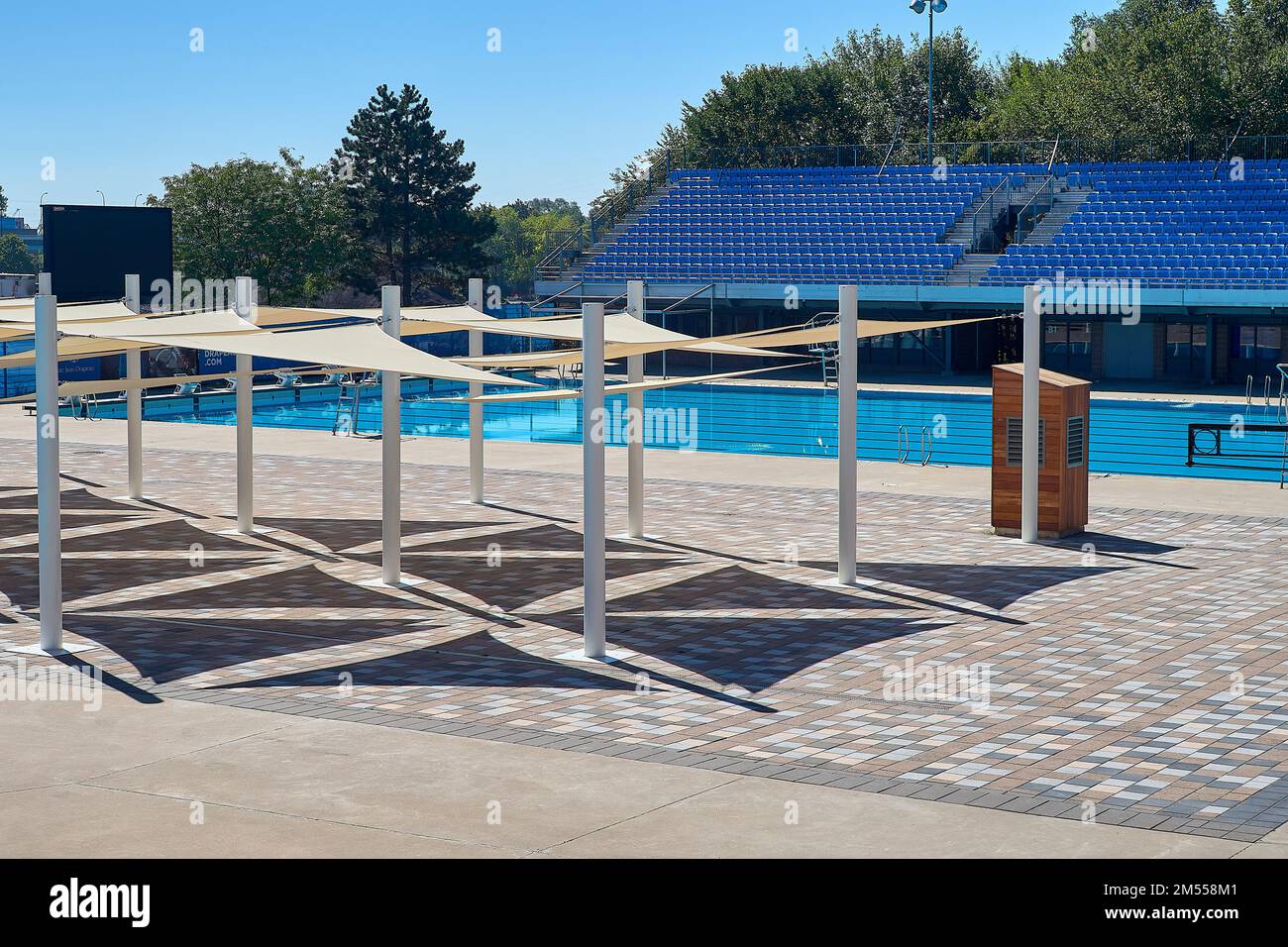 Stands. white seats in the sports pool. Tribune of fans at the sports ...