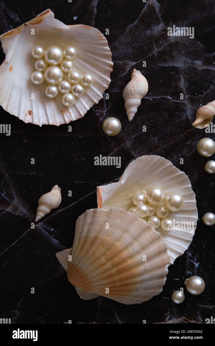 a few pearls in a sea shell Stock Photo - Alamy