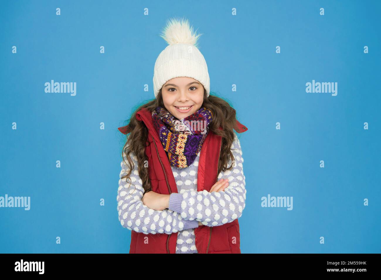 Feeling cozy. no hypothermia. cheerful girl wearing layers of clothing ...