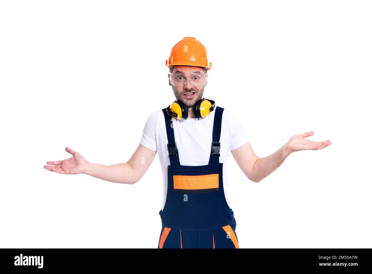 puzzled worker man in studio. worker man wearing uniform. photo of ...