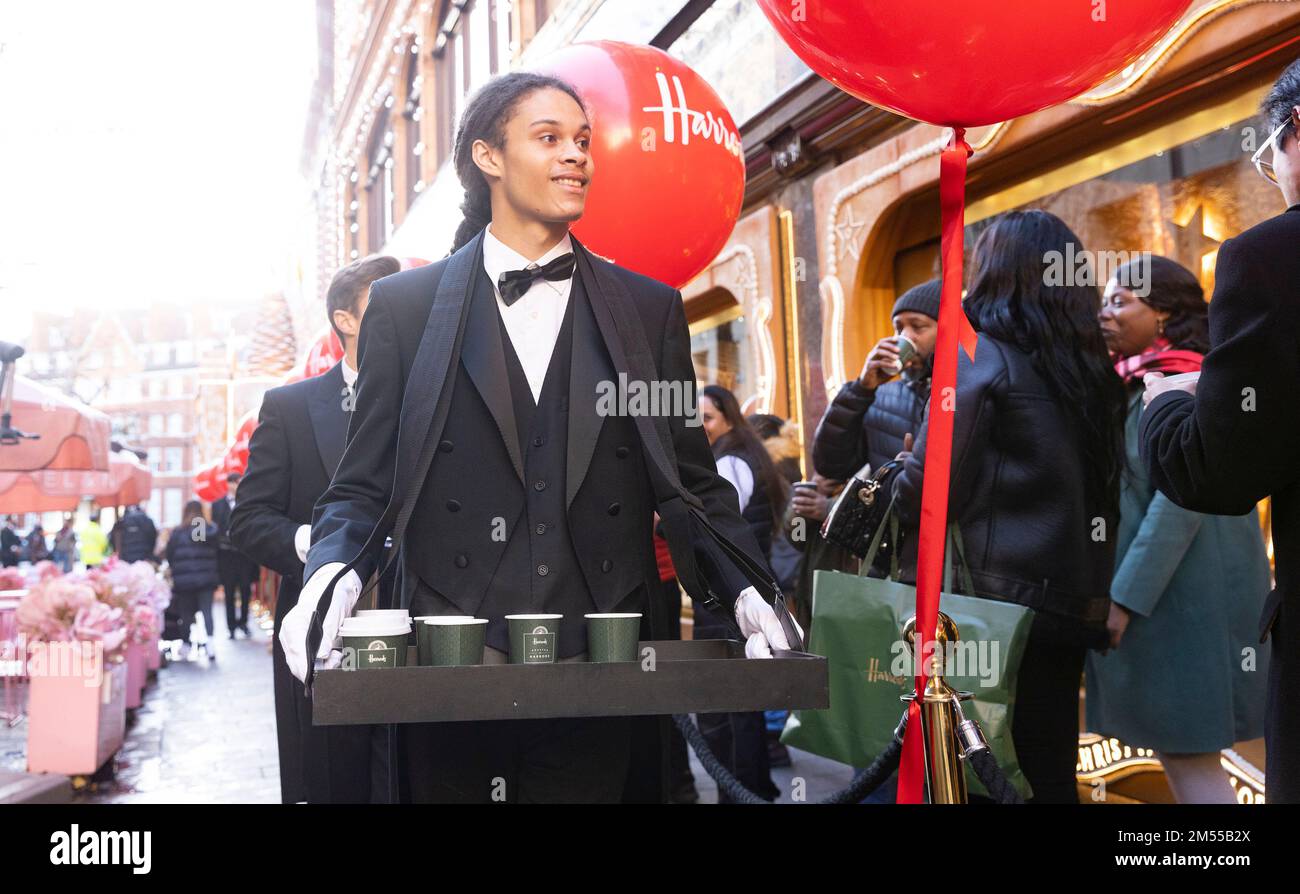 EDITORIAL USE ONLY Jaidyn Sommers offer refreshments to customers ...