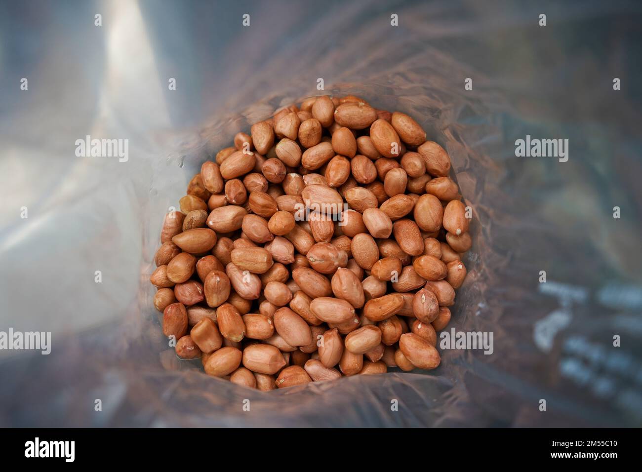 Peanuts in plastic bag hi-res stock photography and images - Alamy