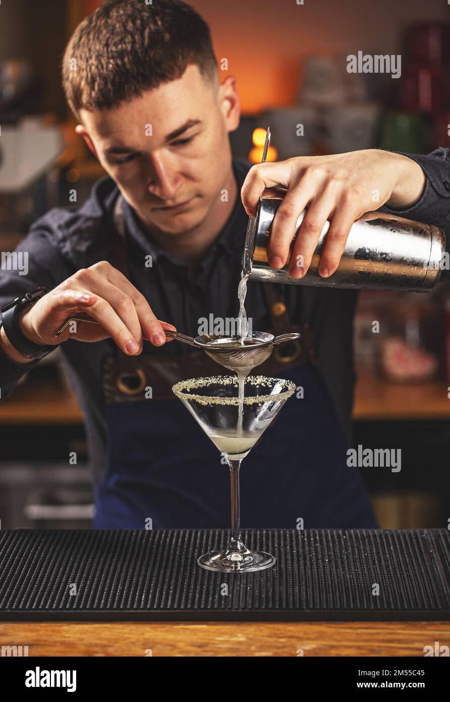 Man bartender holds in hands hi-res stock photography and images - Alamy