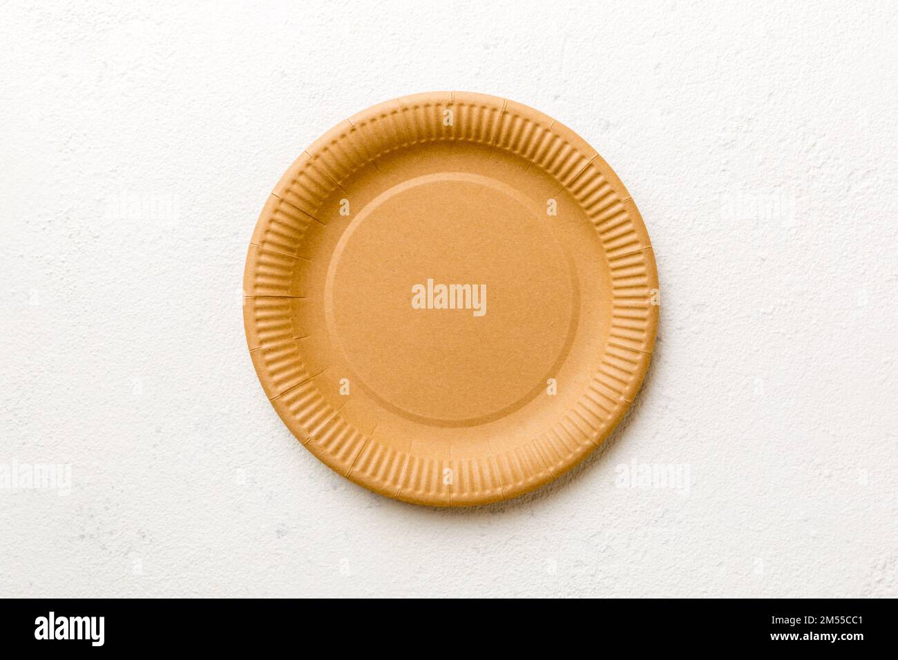 Top view of eco paper plate on cement background. Empty space for your ...