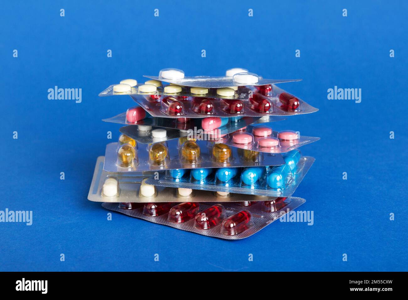 too many different pill cartridges stacked. selective Focus. Packs of ...