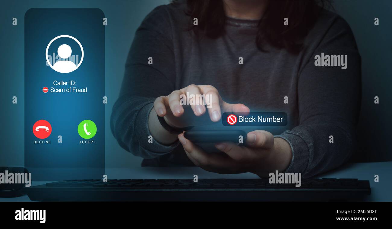 Woman blocking scam call on smartphone. Warning sign of unknown number ...