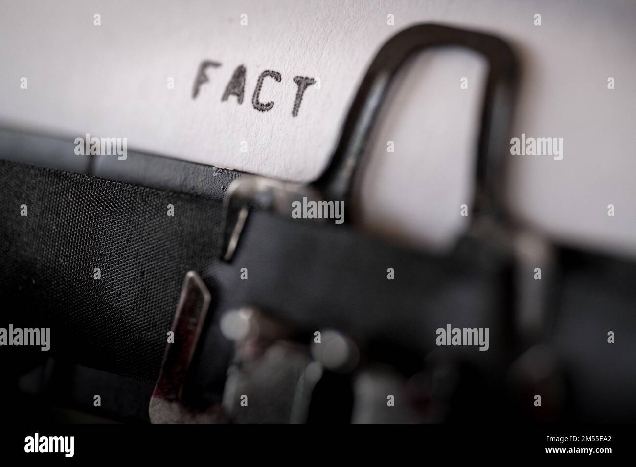 Fact word written on a typewriter Stock Photo - Alamy