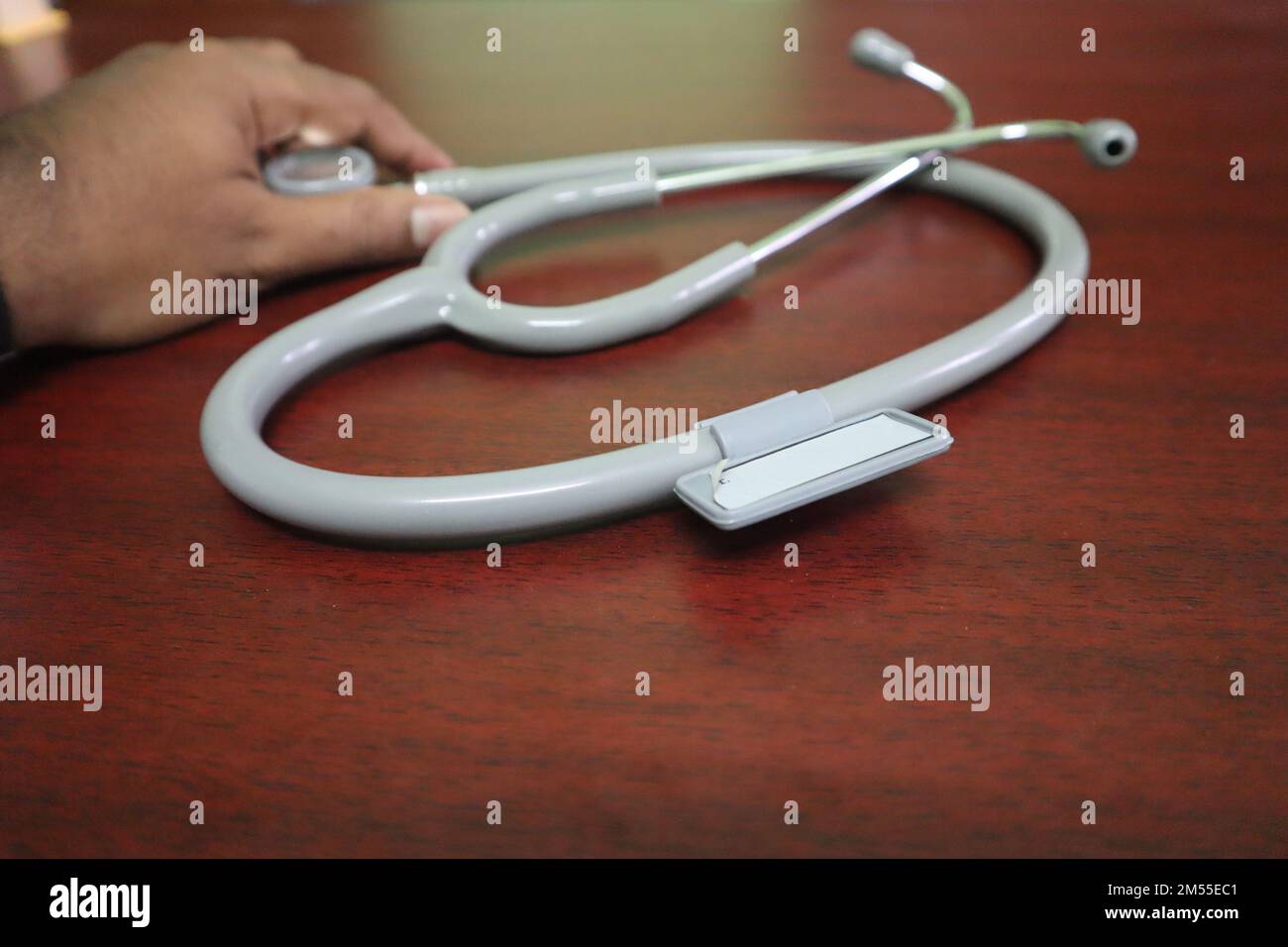 Hand and stethoscope hi-res stock photography and images - Alamy