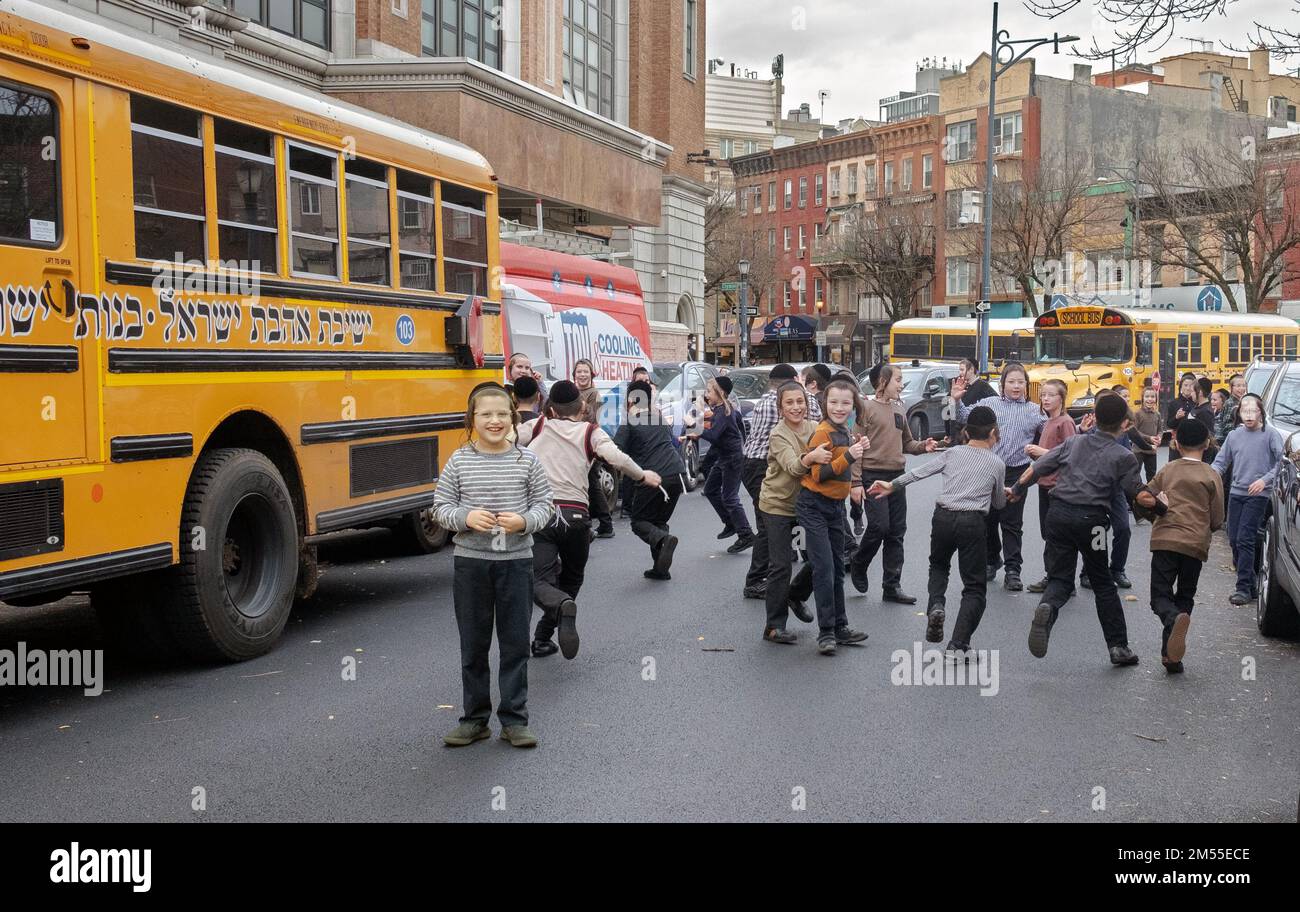 Orthodox jewish yeshiva students pay their recess on a closed off ...