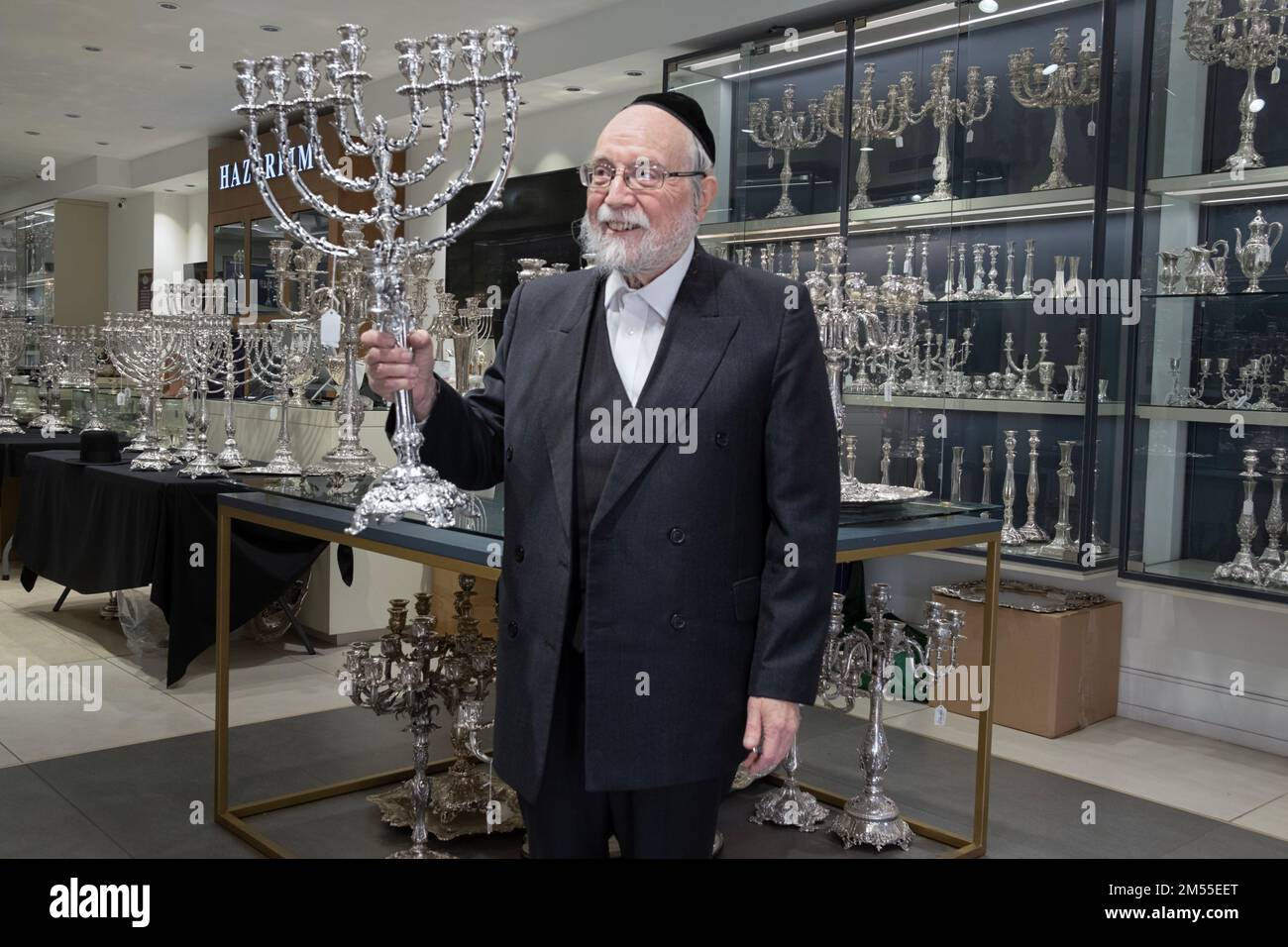 Portarit of an orthodox Jewish man who operates a store selling silver ...