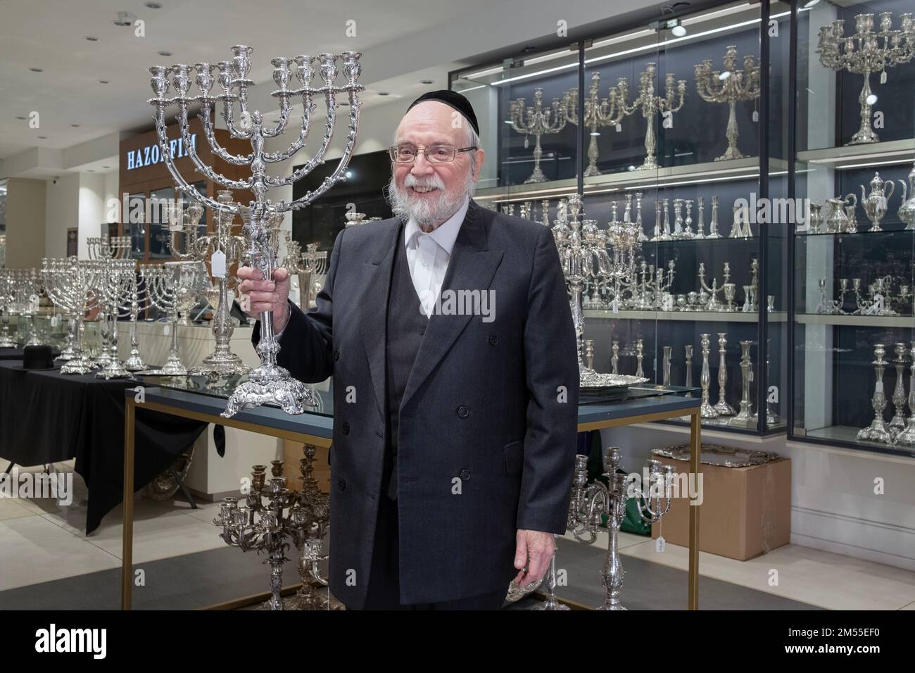 Portarit of an orthodox Jewish man who operates a store selling silver ...