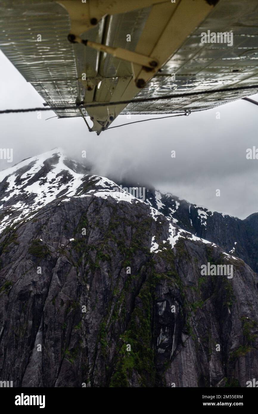 A beautiful view of a tall mountain in Alaska with its snowy peak ...