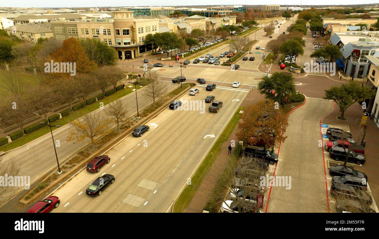An aerial view of the cars driving on the city roads in Dallas, Texas ...