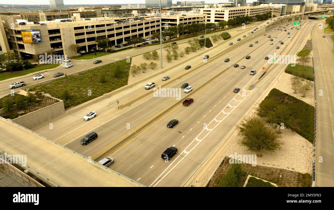 An aerial view of the cars driving on the city roads in Dallas, Texas ...