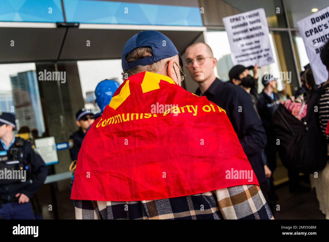 Man with Communist Party of Australia flag at Protest against the Far ...