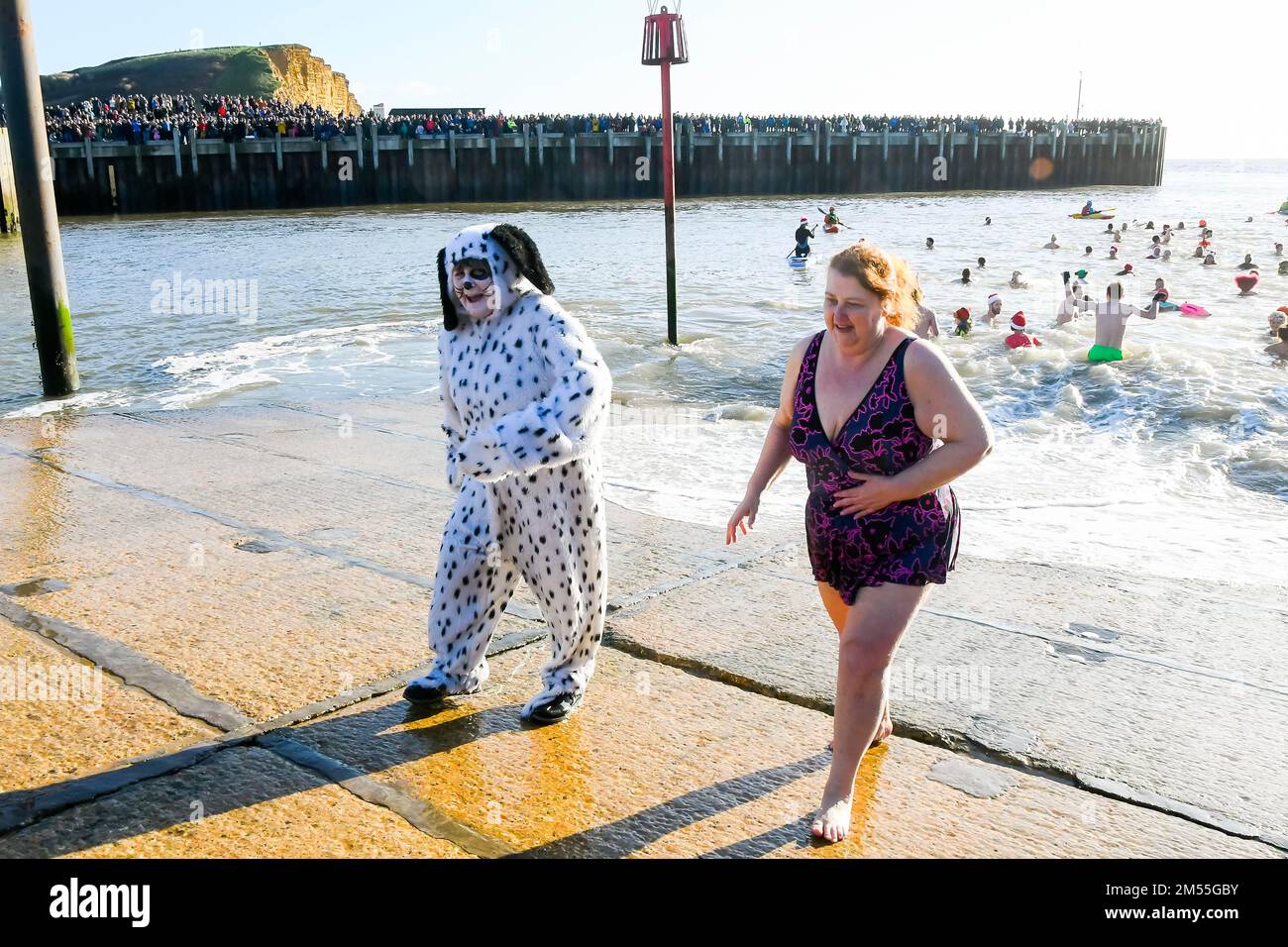 West Bay, Dorset, UK. 26th December 2022. UK Weather. A large crowd ...