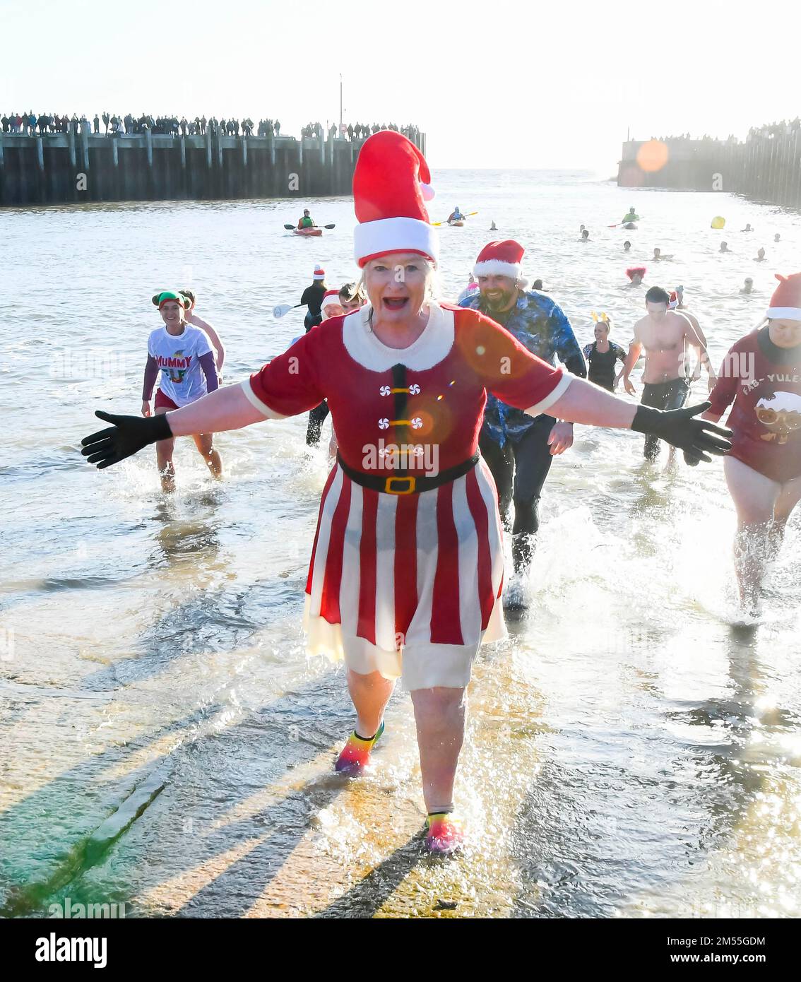 West Bay, Dorset, UK. 26th December 2022. UK Weather. Brave Boxing Day ...