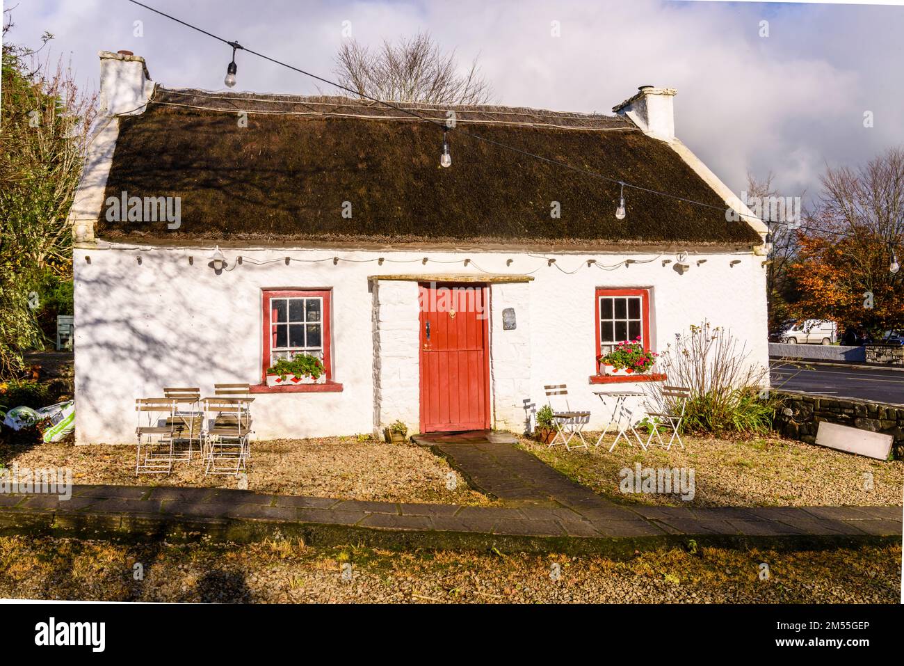 Cute whitewashed Irish cottage, currently in use as a coffee shop and ...