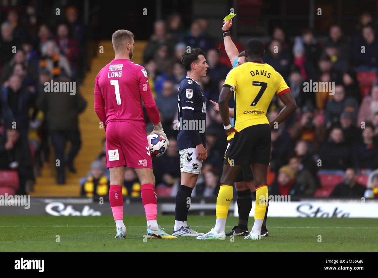 Referee Josh Smith shows a yellow to Millwall's Danny McNamara during ...