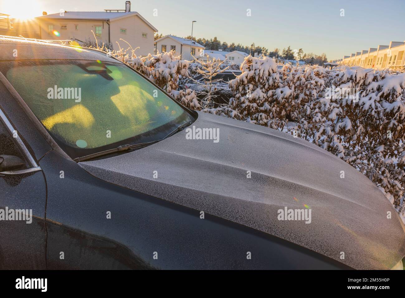 Beautiful view of texture on frozen car windshield on with sun shadows ...