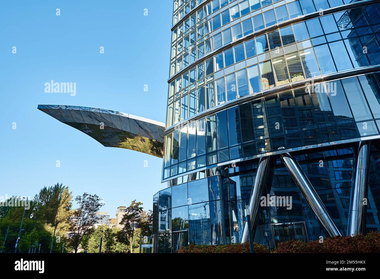 Detail of glass office building facade with reflections. Modern city ...