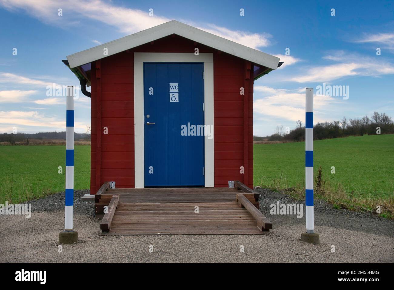 The front of a small clean public bathroom in the countryside in Sweden ...