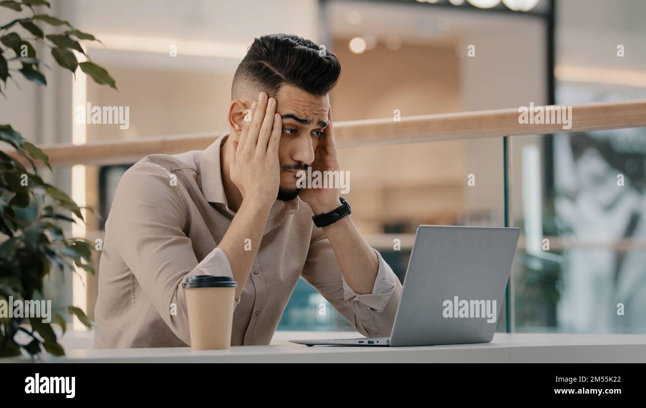 Sad shocked stressed ethnic CEO Indian man worker manager freelancer ...